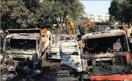 Trucks set on fire - PressReader