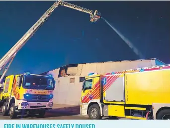 FIRE IN WAREHOUSES SAFELY DOUSED - PressReader