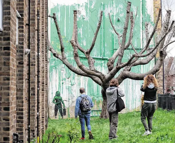 Residents ‘so proud’ as Banksy confirms new mural in London - PressReader