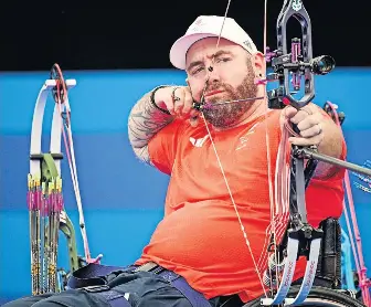 Archer Nathan is on top of the world after striking gold in Paris ...