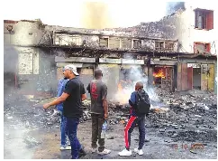 Fire destroys downtown shopping mall - PressReader