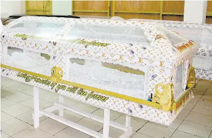 Miller wants see-through caskets draped - PressReader