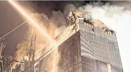Fire devastates historic Templeton Feed & Grain - PressReader