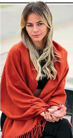 ‘Lady in red’ reveals how she survived festival hell - PressReader