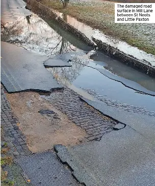 Petition call for repairs to road hit by flooding - PressReader
