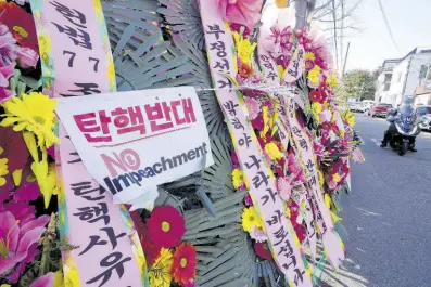 Opposition-controlled National Assembly votes to impeach acting ...