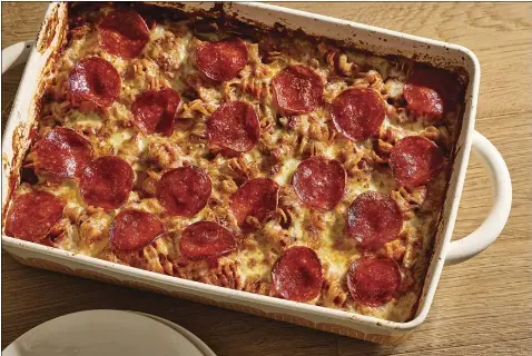 This cheesy baked pasta has pepperoni pizza party vibes - PressReader