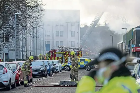 Residents evacuated as fire destroys car garage near Pittodrie Stadium ...