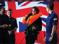 Princess gets the giggles when inflating lifejacket surprises her on royal visit - PressReader