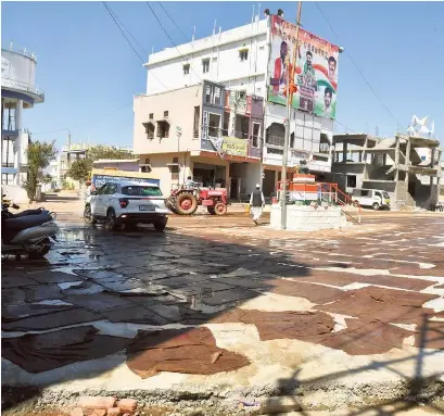 A village divided by a three-foot road - PressReader