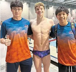 Jayden savours new national record and picture taken with Olympic champion Marchand - PressReader