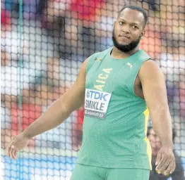 King of the Ring Smikle hits Olympic mark - PressReader