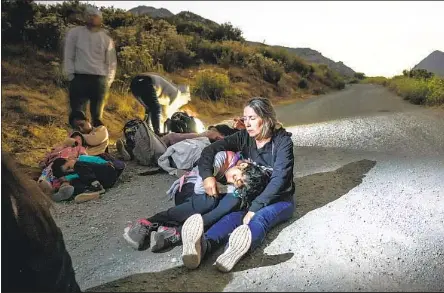 Tired, confused at the border - PressReader