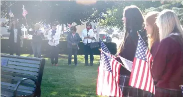 Flag waving ceremony commemorat­es 20th anniversar­y of Sept. 11 - PressReader