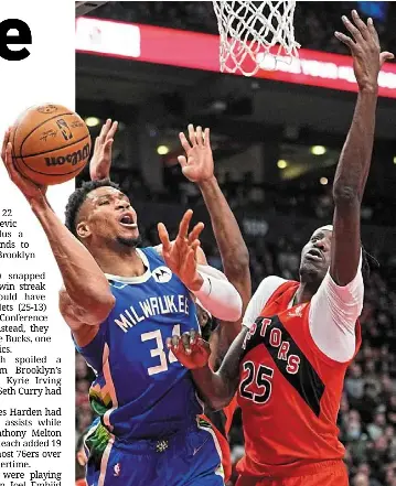 Giannis’ triple sink Raptors - PressReader