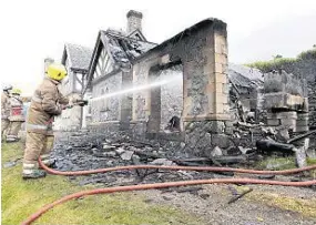 Outhouse fire stopped before it reached historic A-listed building in ...