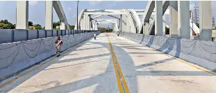 One lane of Elephant Gate bridge opens to traffic - PressReader