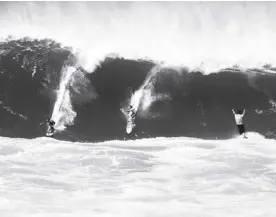 Huge waves bring Hawaii surf contest The Eddie after hiatus - PressReader