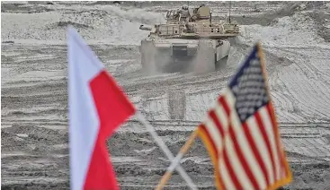 US delivers tanks, armoured vehicles to NATO storage facility in Poland ...