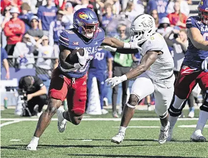 Kansas football runs all over UCF in Big 12 blowout - PressReader