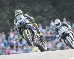 Macadam Triumph riders light up the track at Cadwell Park - PressReader