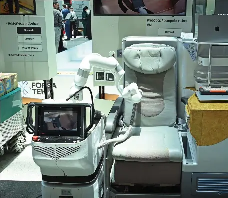 Emirates tests robots for cleaning seats and VR gloves for training ...
