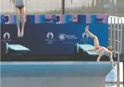French diver reacts to tumble - PressReader