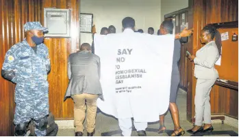 President signs new anti-gay law with death penalty in some cases ...