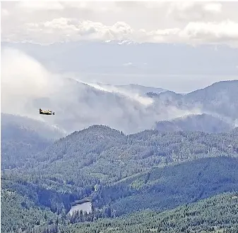 Sooke-area wildfire grows but moving away from town - PressReader