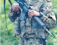 JDF uniforms feature in robbery - PressReader